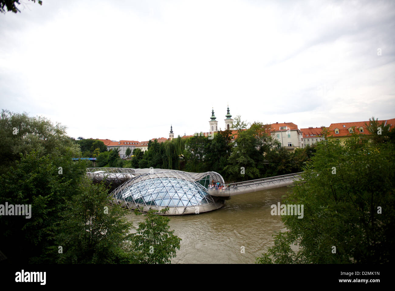 The Murinsel, a modern floating island and pedestrian bridge on the Mur ...