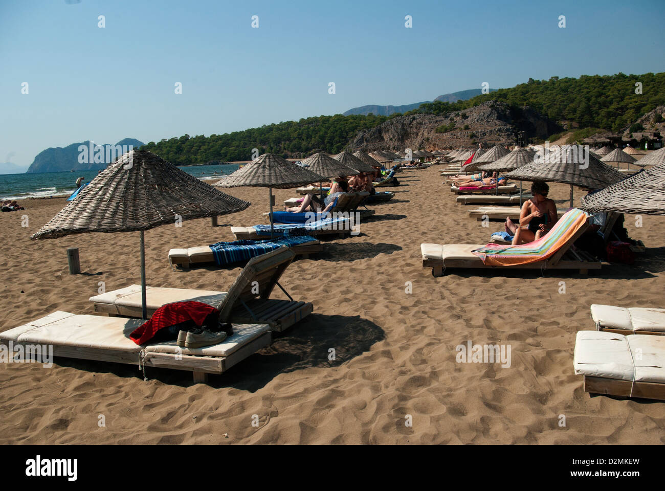 Beach sunbathers hi-res stock photography and images - Alamy
