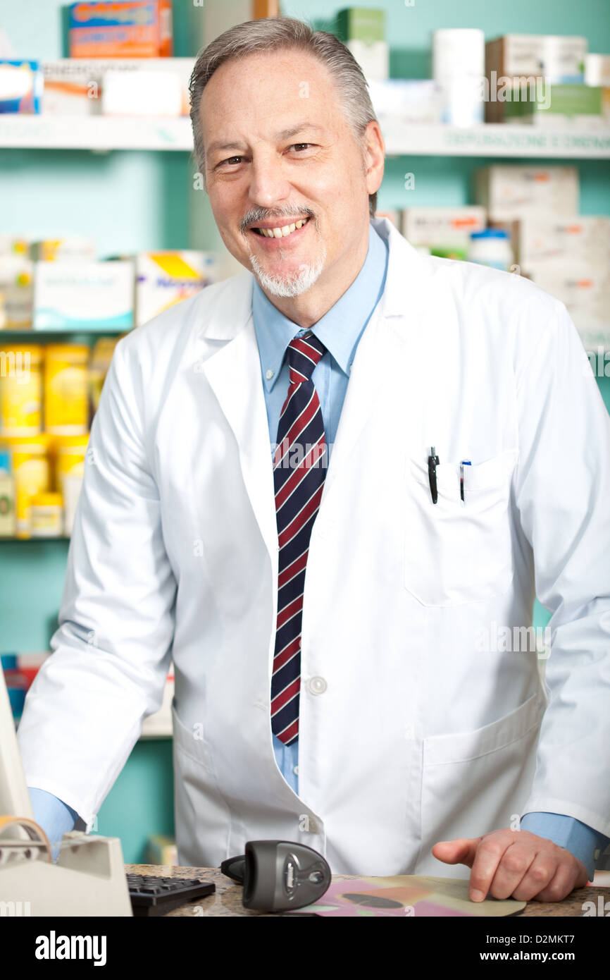 Pharmacist at work in his pharmacy Stock Photo - Alamy