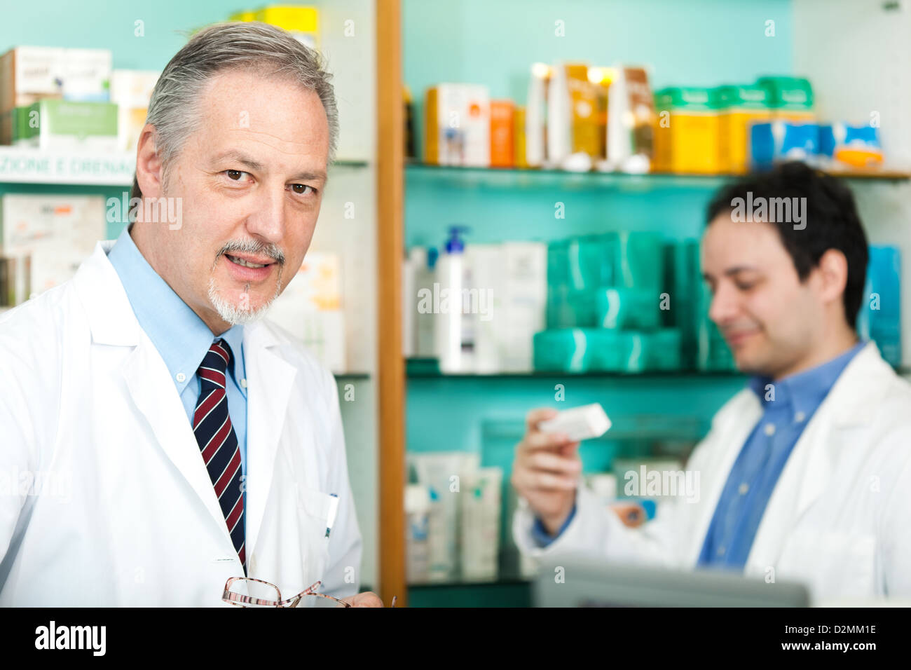 Pharmacist at work in his pharmacy Stock Photo - Alamy