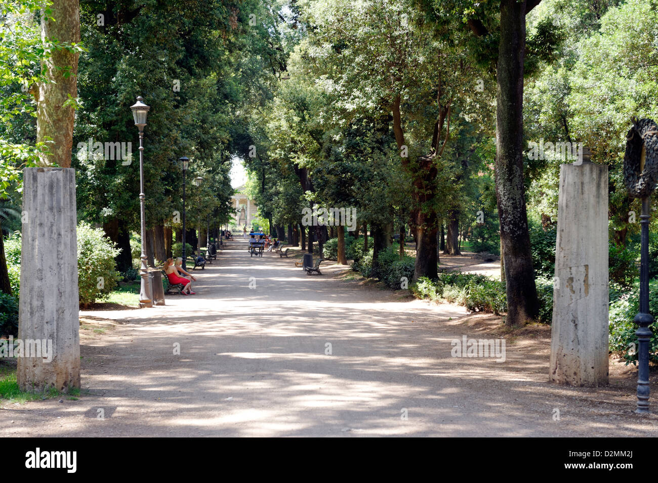 Rome. Italy. View of a leafy tree lined avenue at the Villa Borghese ...