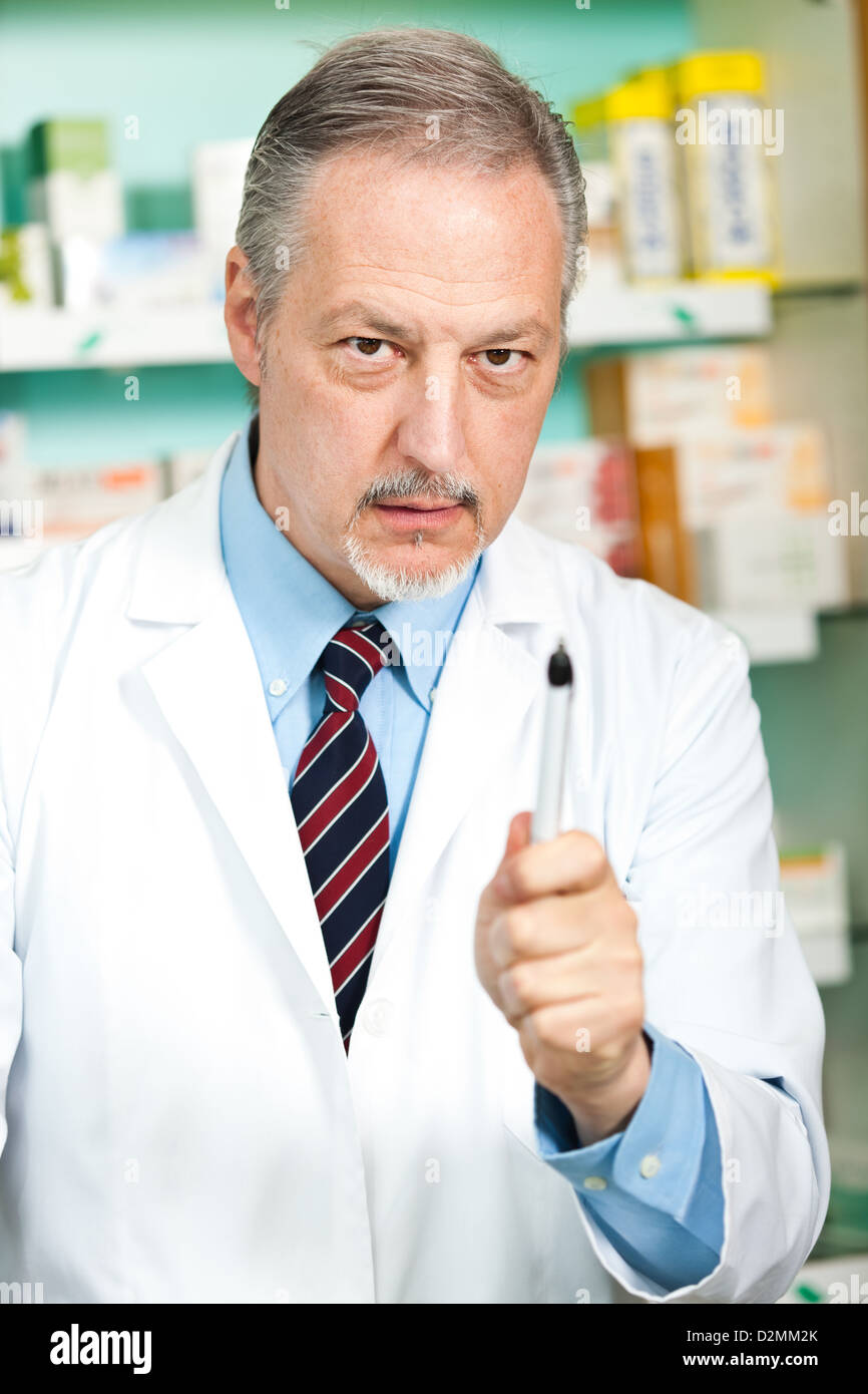 Pharmacist at work in his pharmacy Stock Photo - Alamy