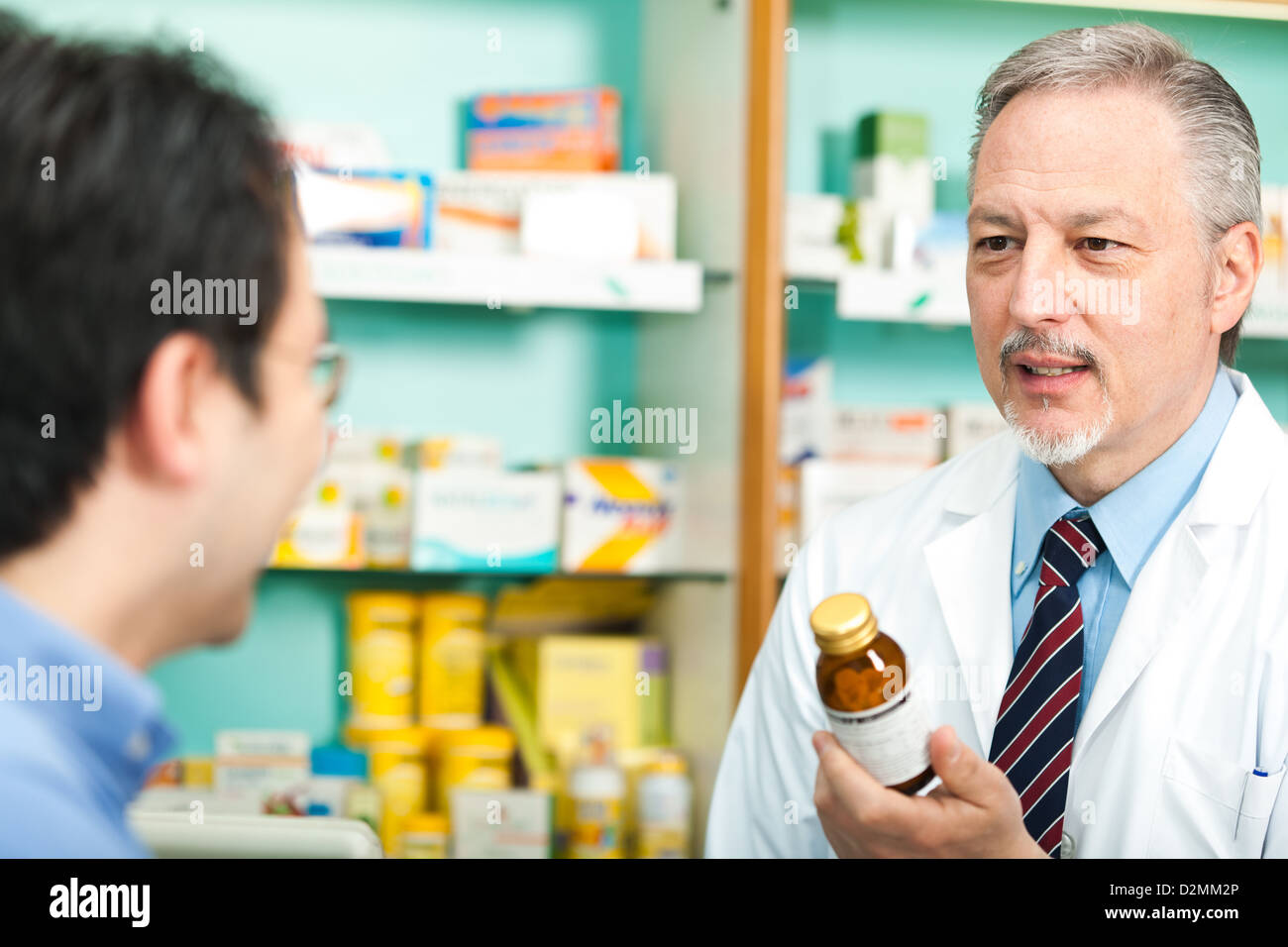 Pharmacist at work in his pharmacy Stock Photo - Alamy