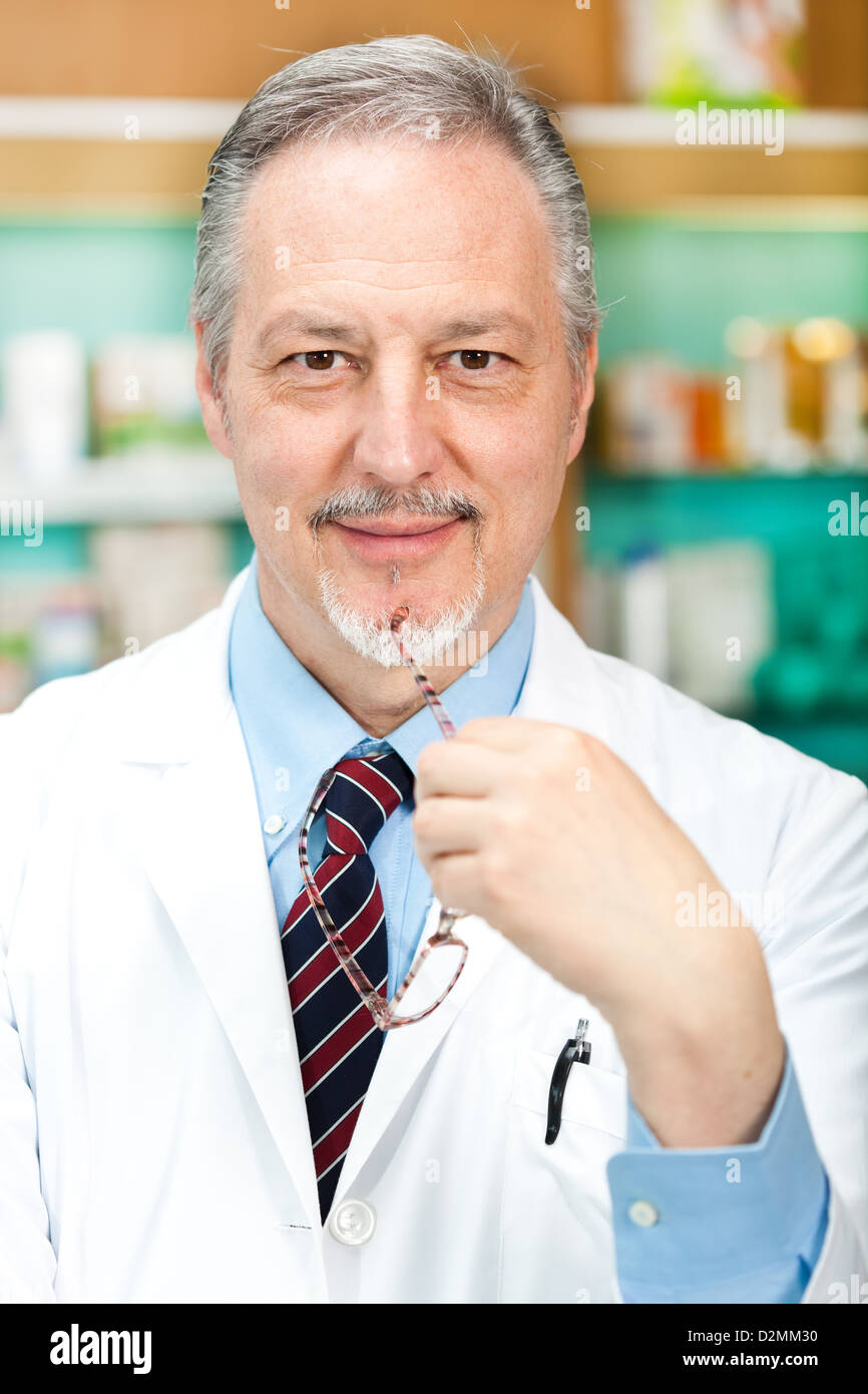 Pharmacist at work in his pharmacy Stock Photo - Alamy
