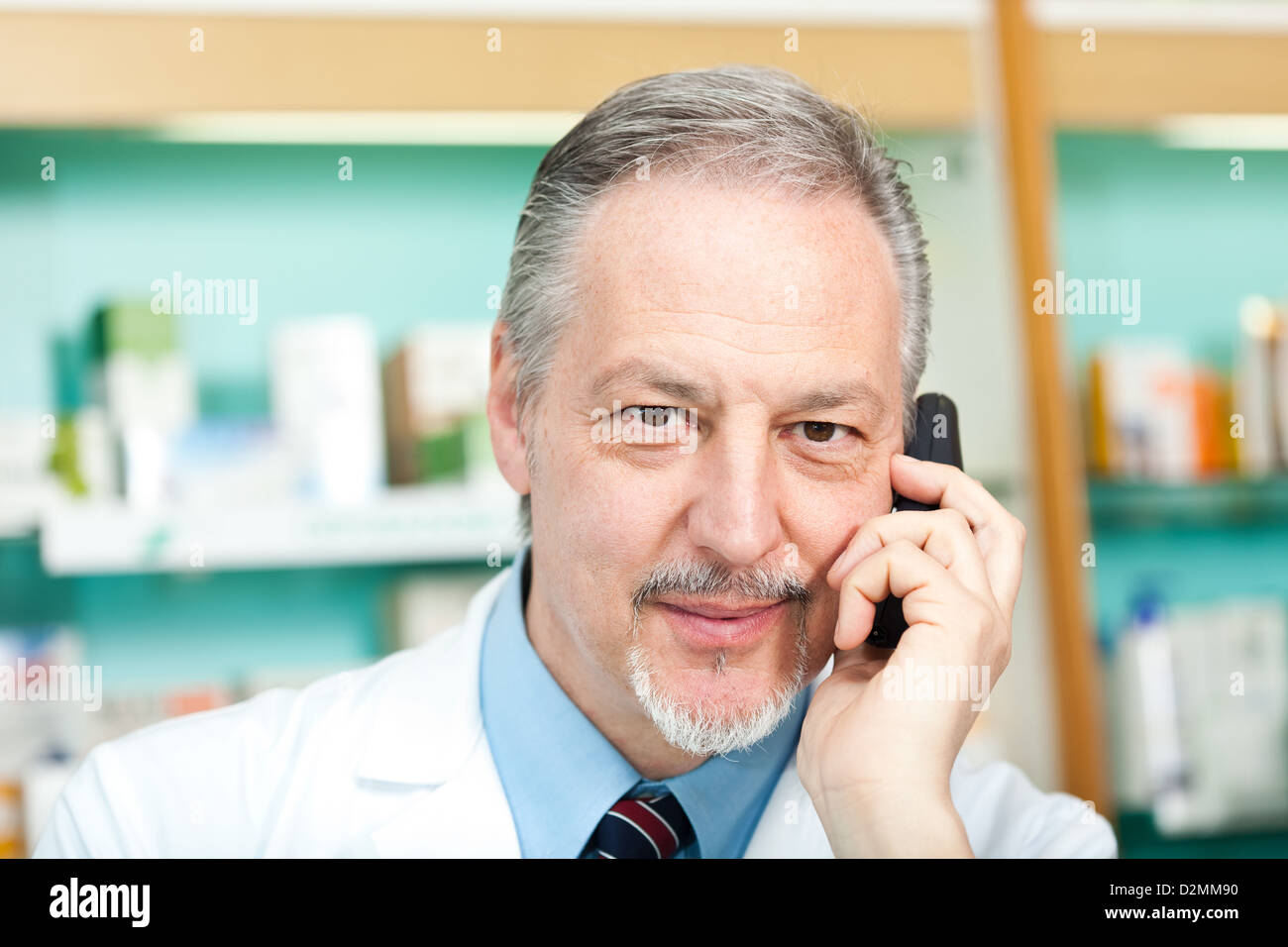 Pharmacist at work in his pharmacy Stock Photo - Alamy