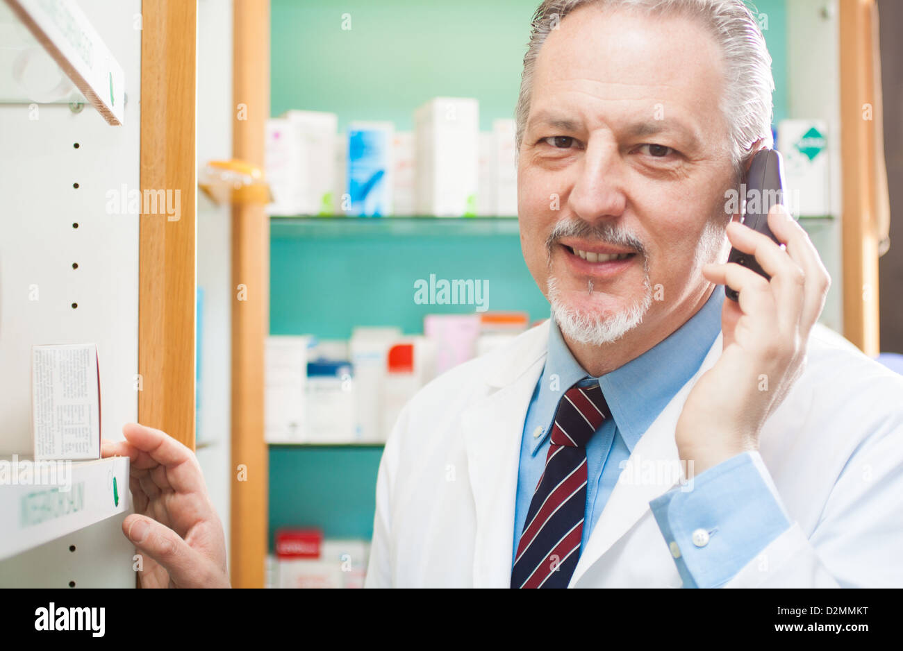 Pharmacist at work in his pharmacy Stock Photo - Alamy
