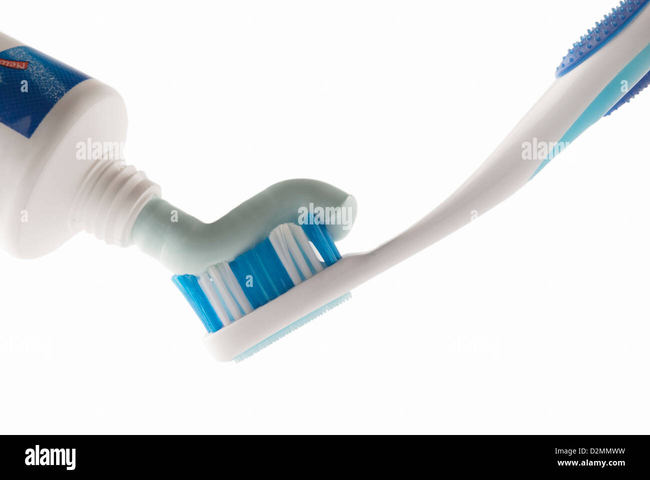 Toothpaste being squeezed onto toothbrush Stock Photo - Alamy