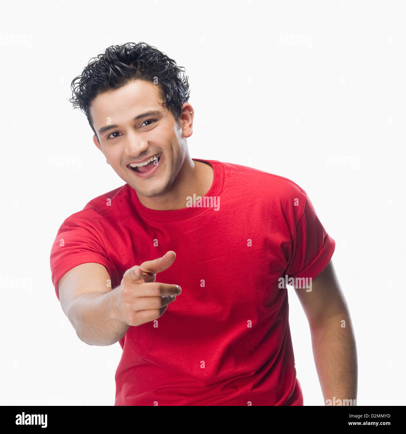 Portrait of a man pointing and smiling Stock Photo - Alamy