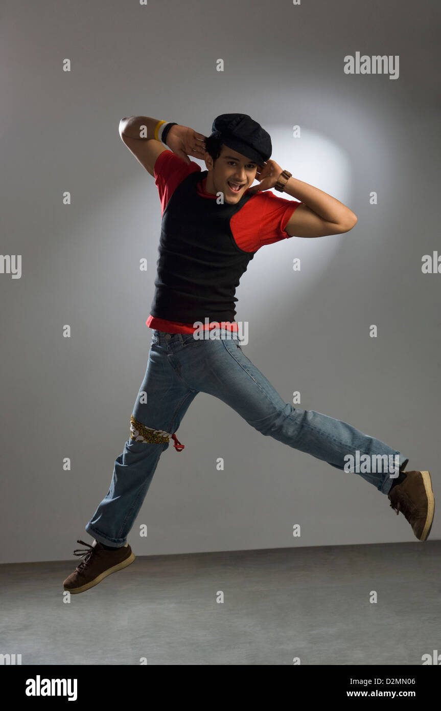 Portrait of a man jumping Stock Photo - Alamy