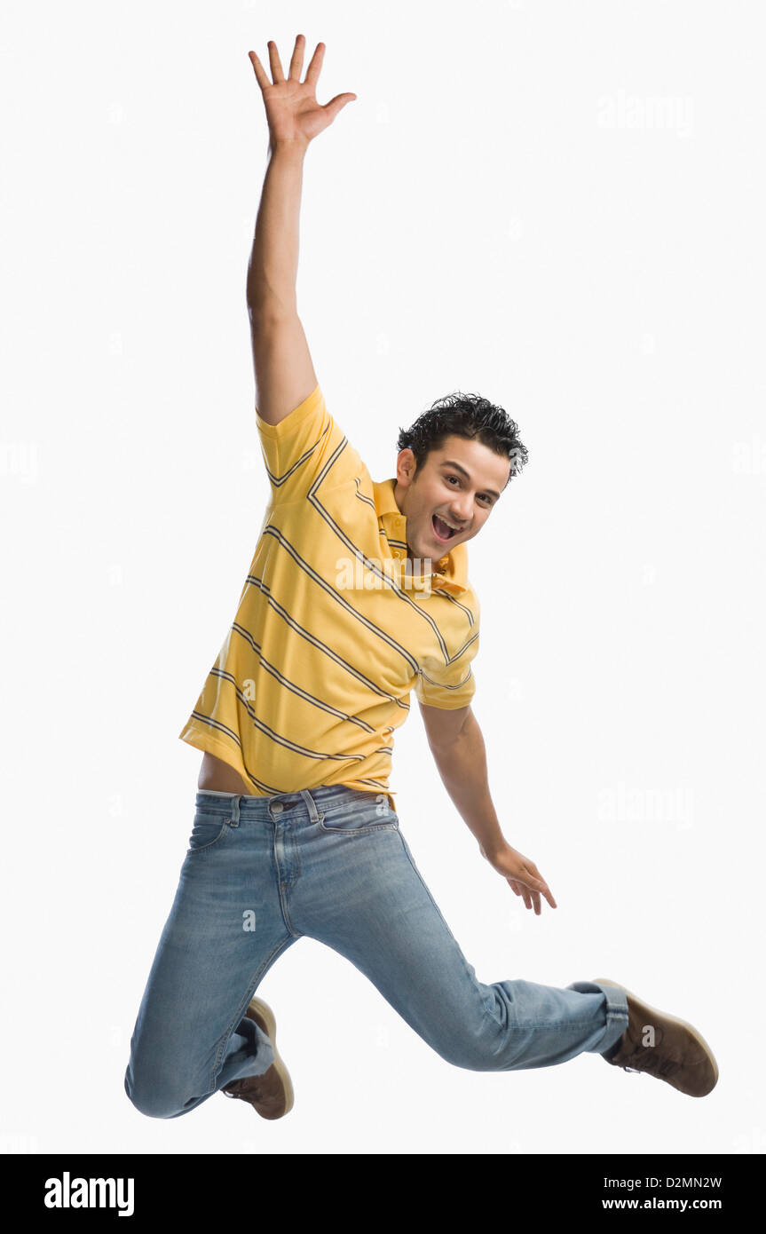 Portrait of a man jumping in excitement Stock Photo - Alamy