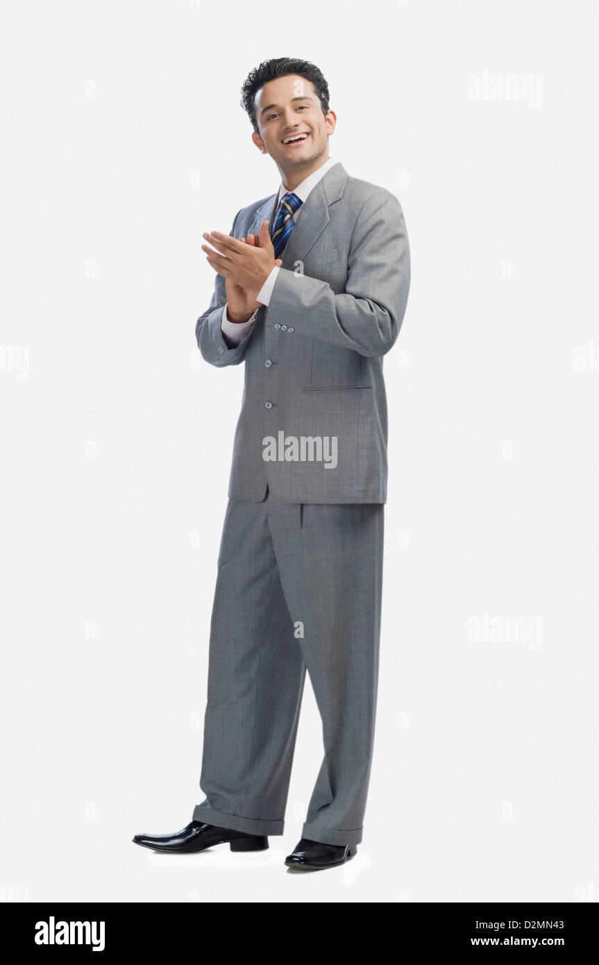 Business man clapping smiling isolated hi-res stock photography and ...