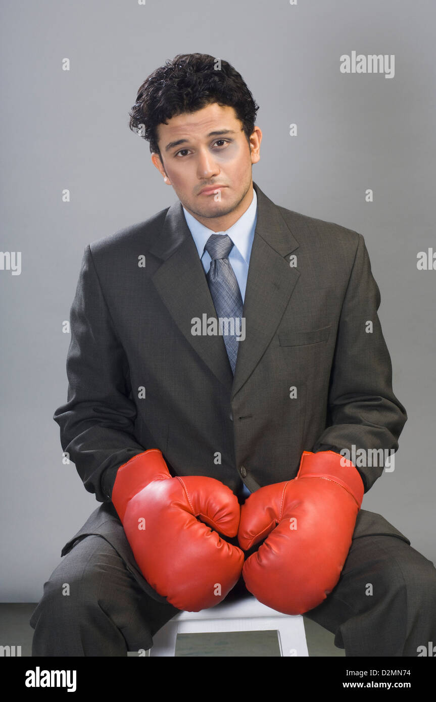 Portrait businessman bruise looking camera hi-res stock photography and ...