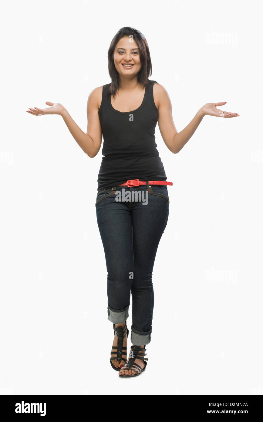Portrait of a woman shrugging Stock Photo - Alamy