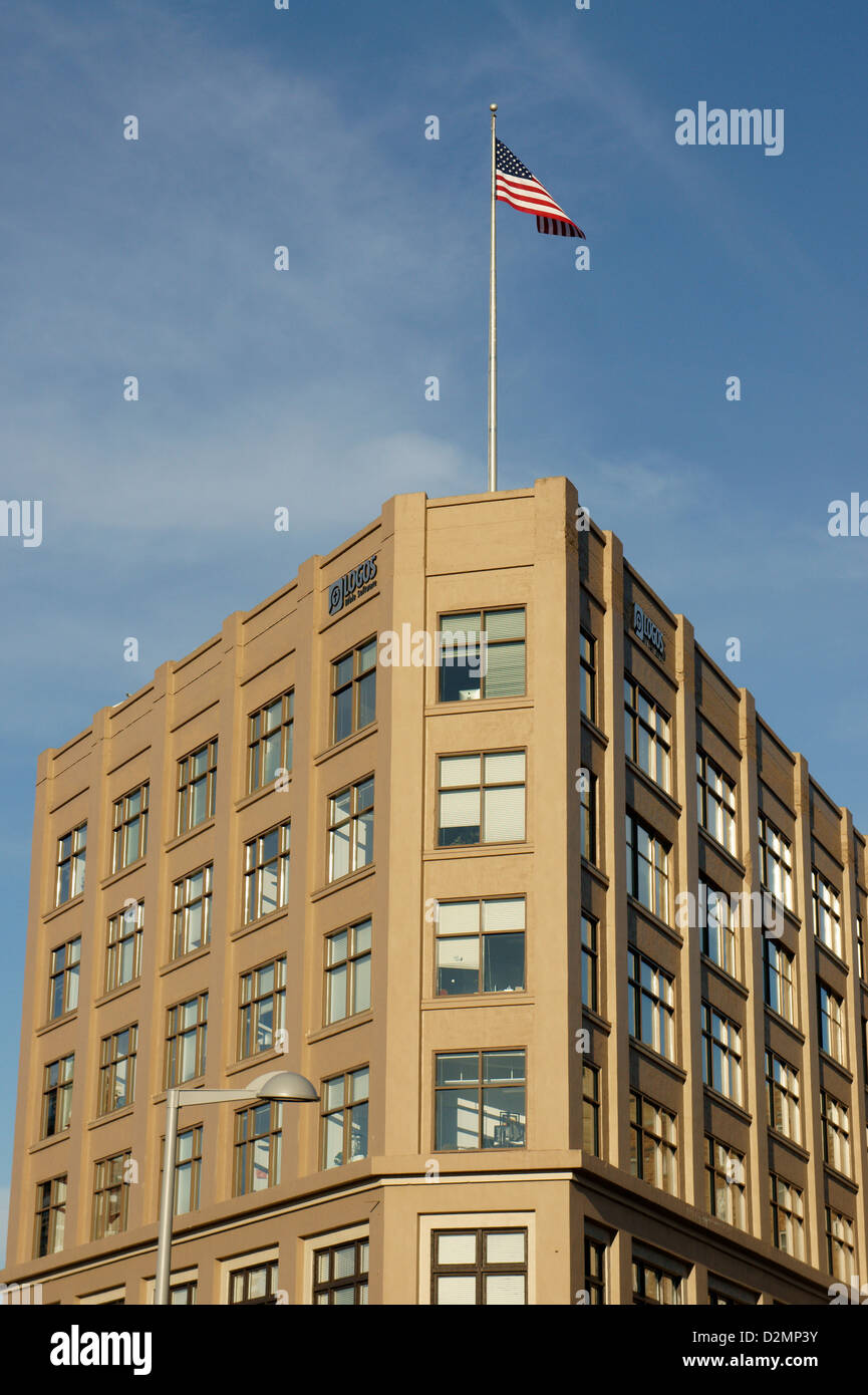 Usa flag flying above building hi-res stock photography and images - Alamy