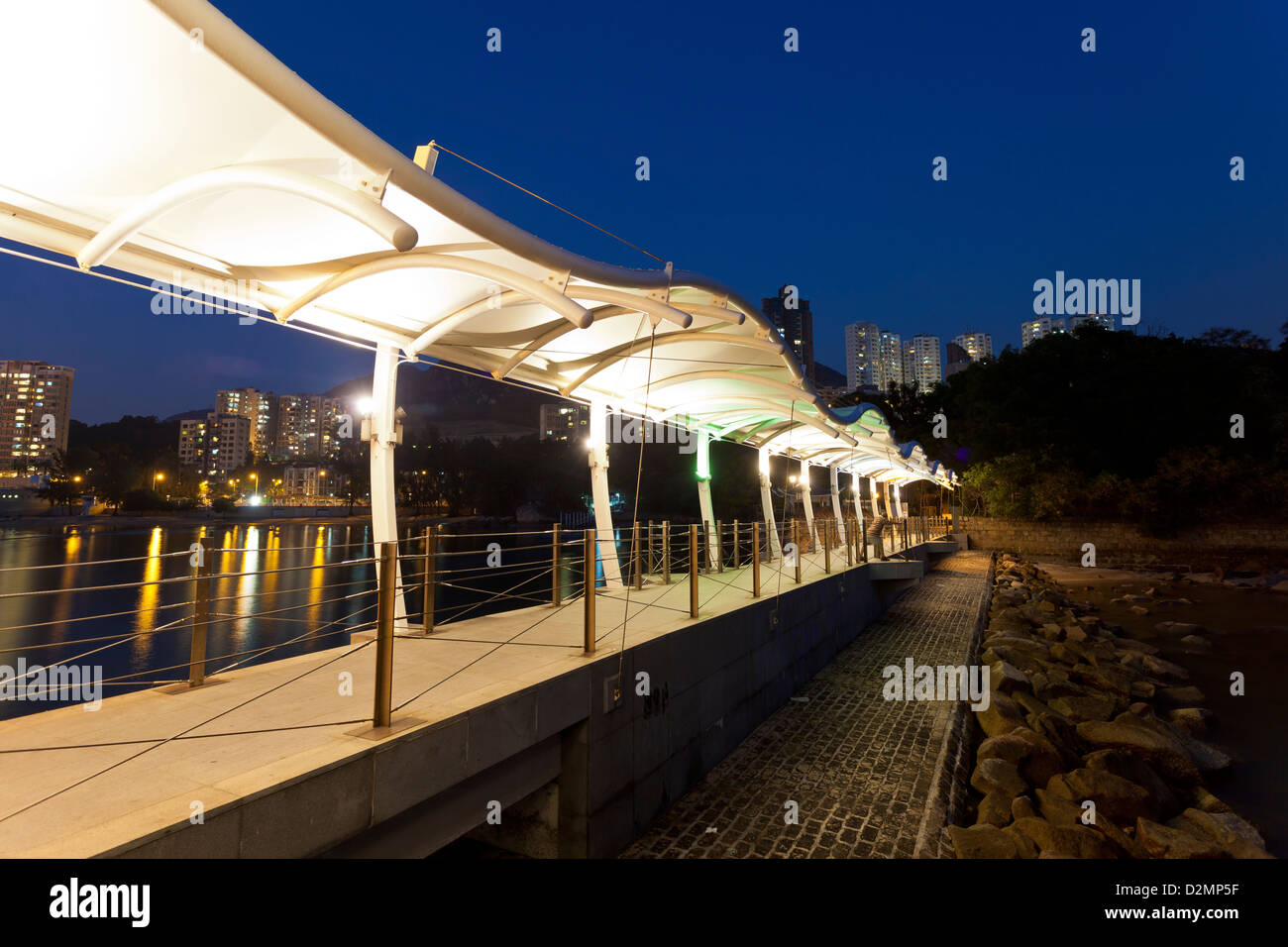 Footbridge along the coast at night Stock Photo - Alamy