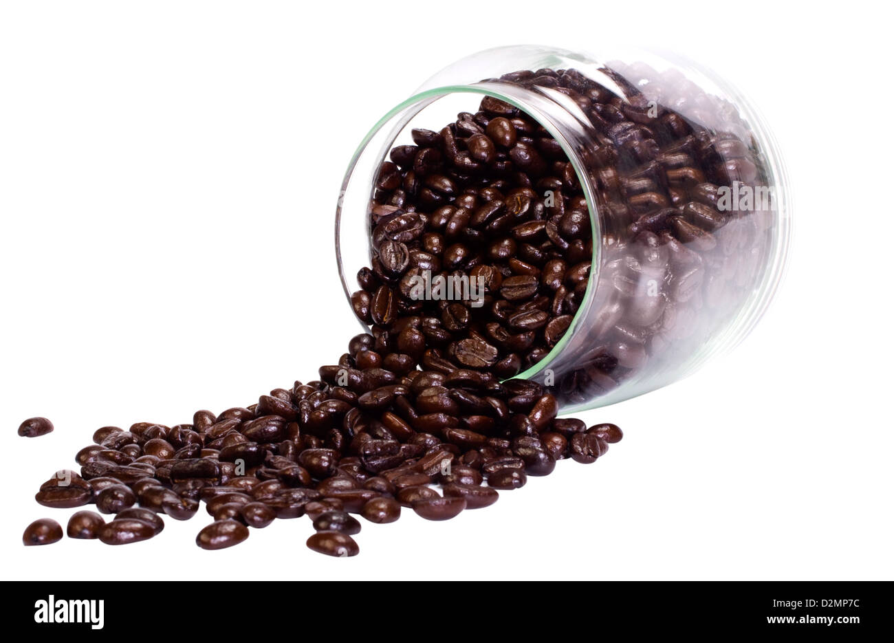 Coffee beans spilling out from a jar Stock Photo - Alamy