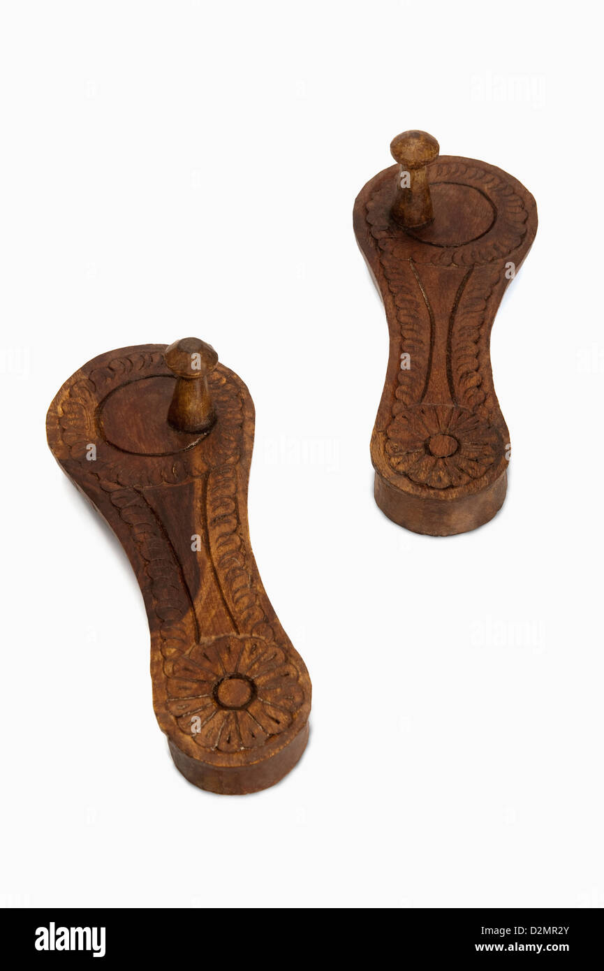Close-up of a pair of Paduka a traditional Indian wooden footwear worn ...