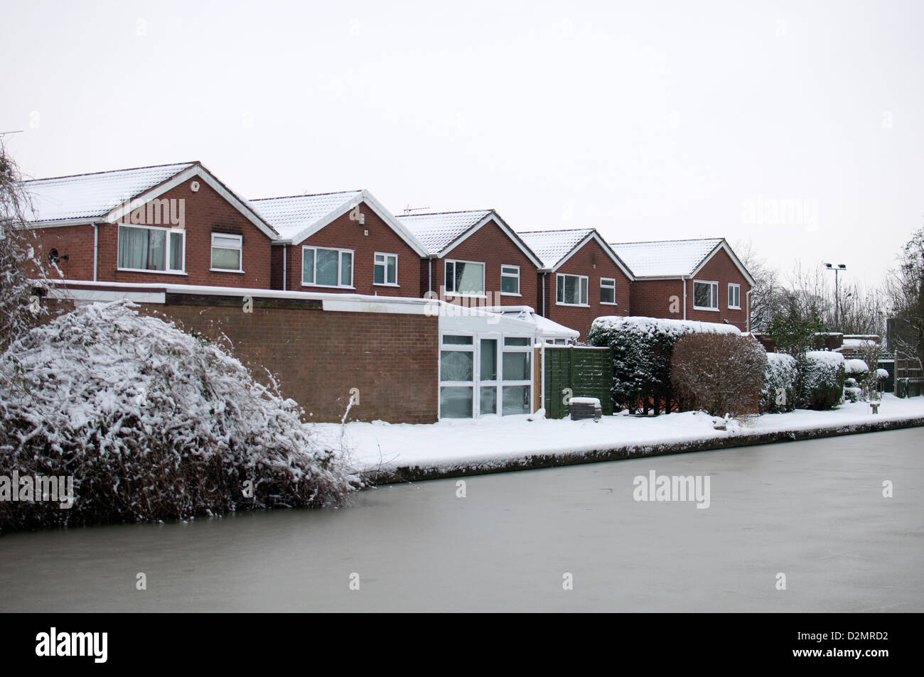 Canalside houses in winter Stock Photo - Alamy