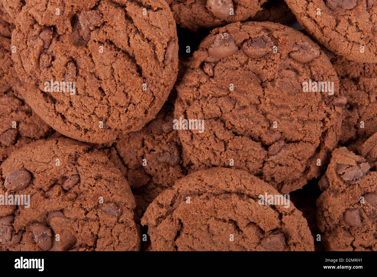 Chocolate chip cookies texture background Stock Photo - Alamy