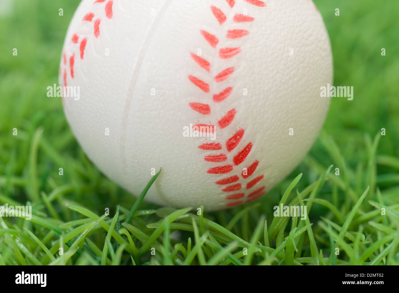 Close-up of a baseball on grass Stock Photo - Alamy