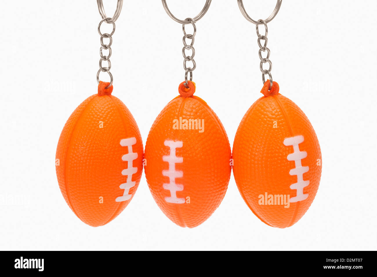 Close-up of American football shaped key rings Stock Photo - Alamy