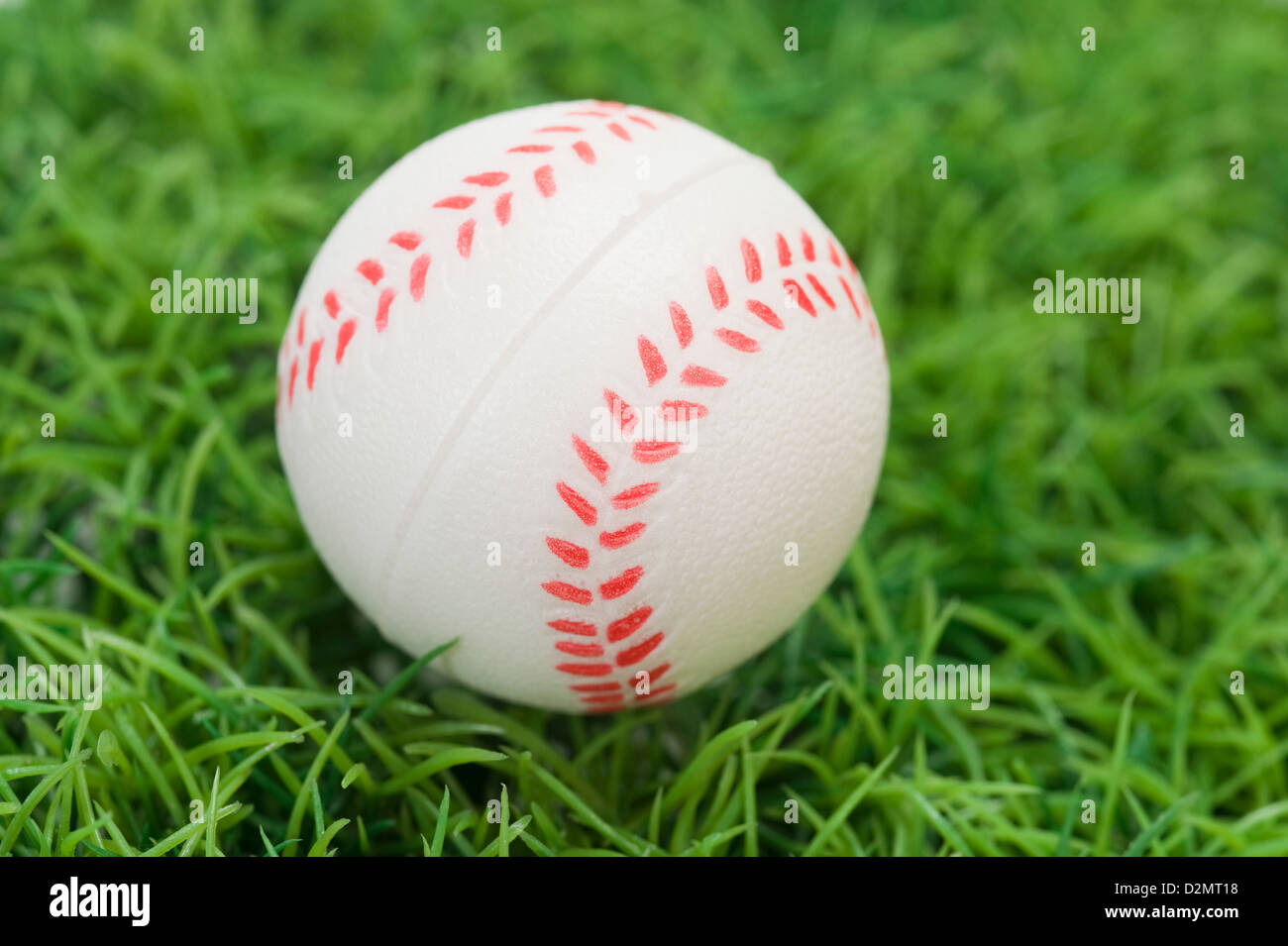 Close-up of a baseball on grass Stock Photo - Alamy