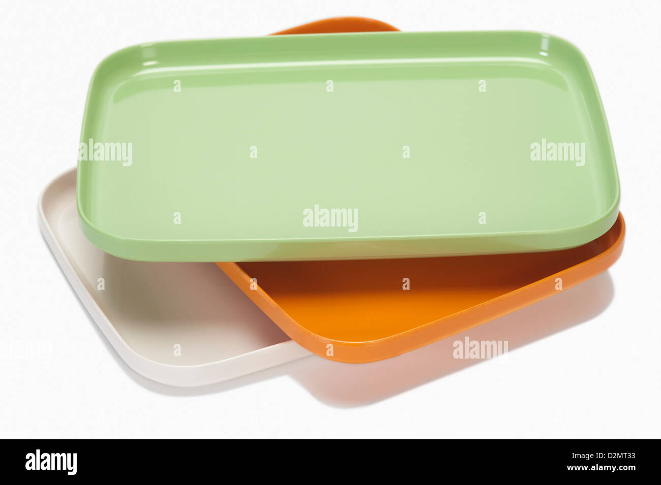 Close-up of a stack of colorful trays Stock Photo - Alamy