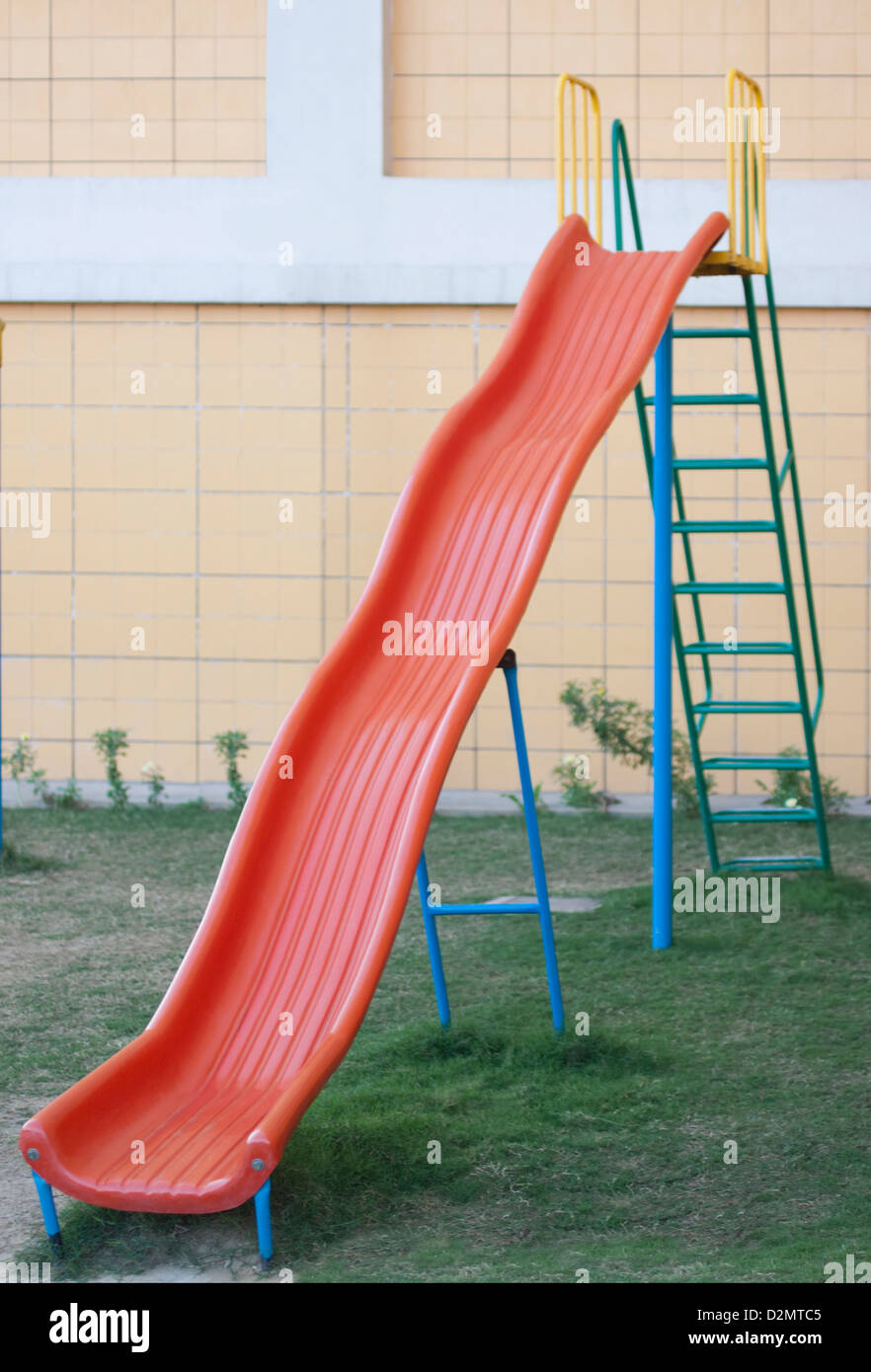 Slide in a park Stock Photo - Alamy