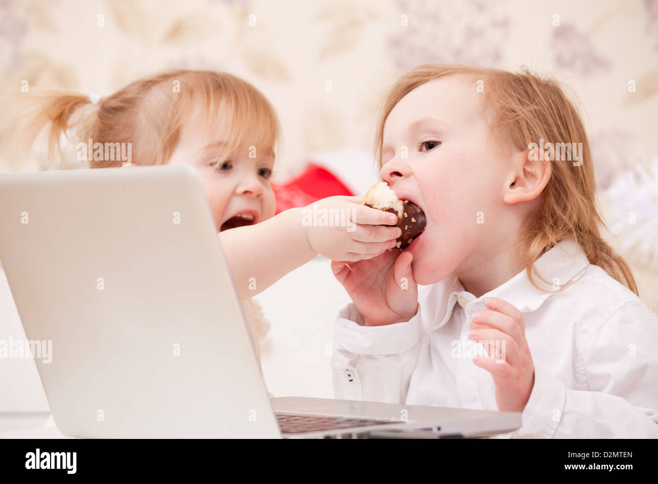 Children with laptop indoors Stock Photo - Alamy