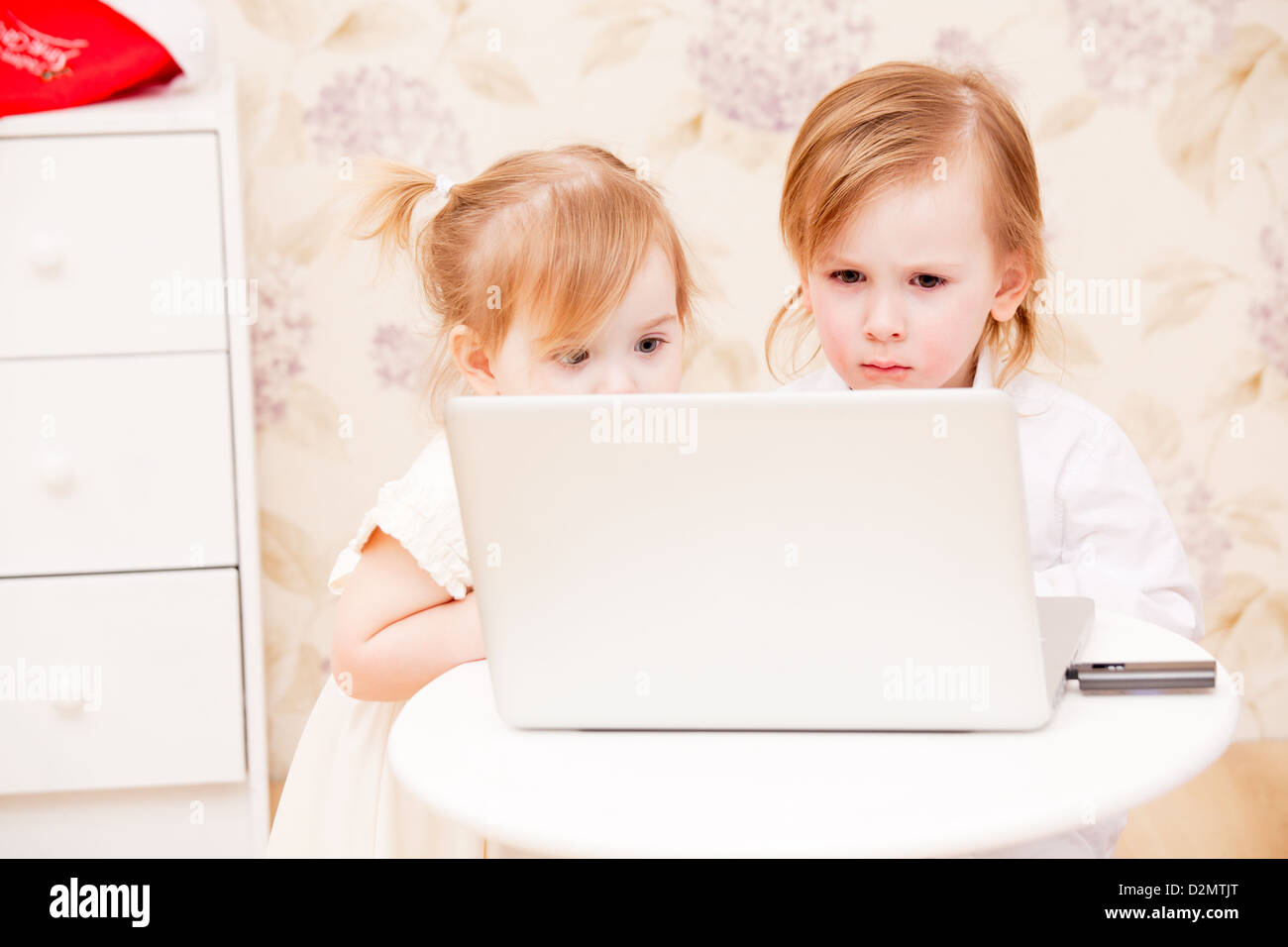 Children with laptop indoors Stock Photo - Alamy