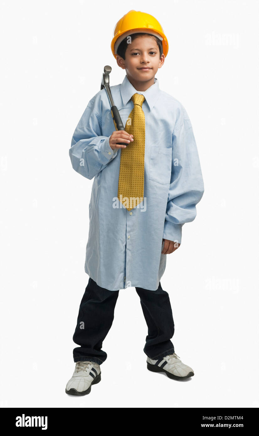 Boy dressed as an architect and holding a hammer Stock Photo - Alamy