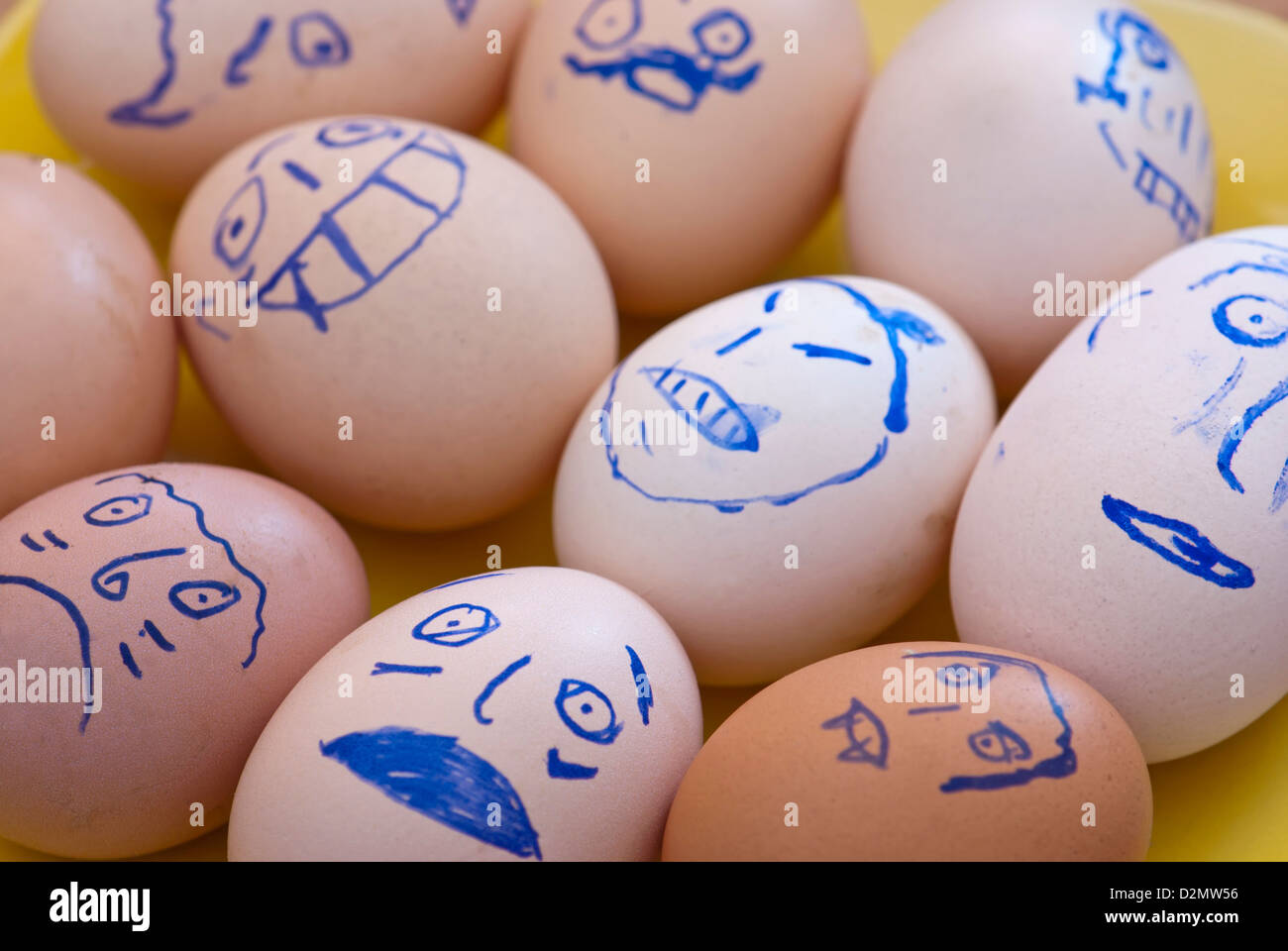 Different of face painted eggs Stock Photo - Alamy