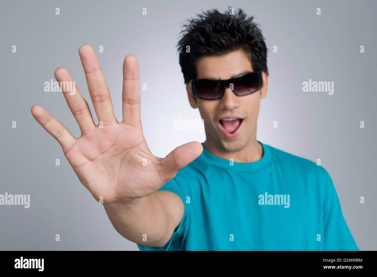 Close-up of a man showing stop gesture Stock Photo - Alamy