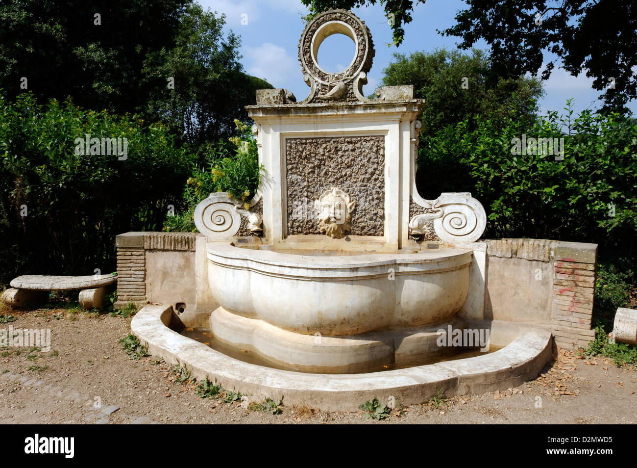 Rome. Italy. View of a small decorative fountain on the extensive ...