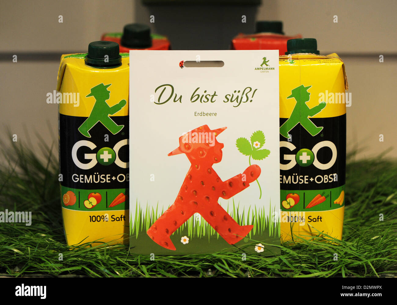 Boxes of vegetable and fruit juice are pictured with the Ampelmann logo ...