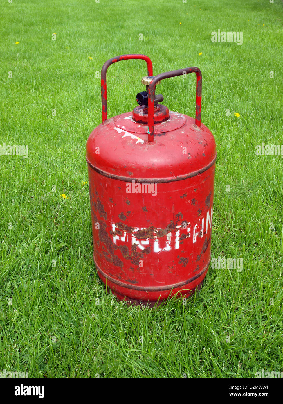 Red color propane gas cylinder outdoor Stock Photo - Alamy