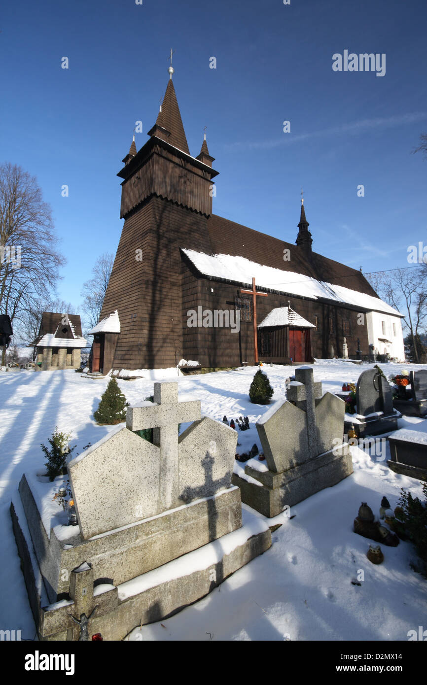 A very old wooden church on a hilltop on a beautiful sunny winter's day ...