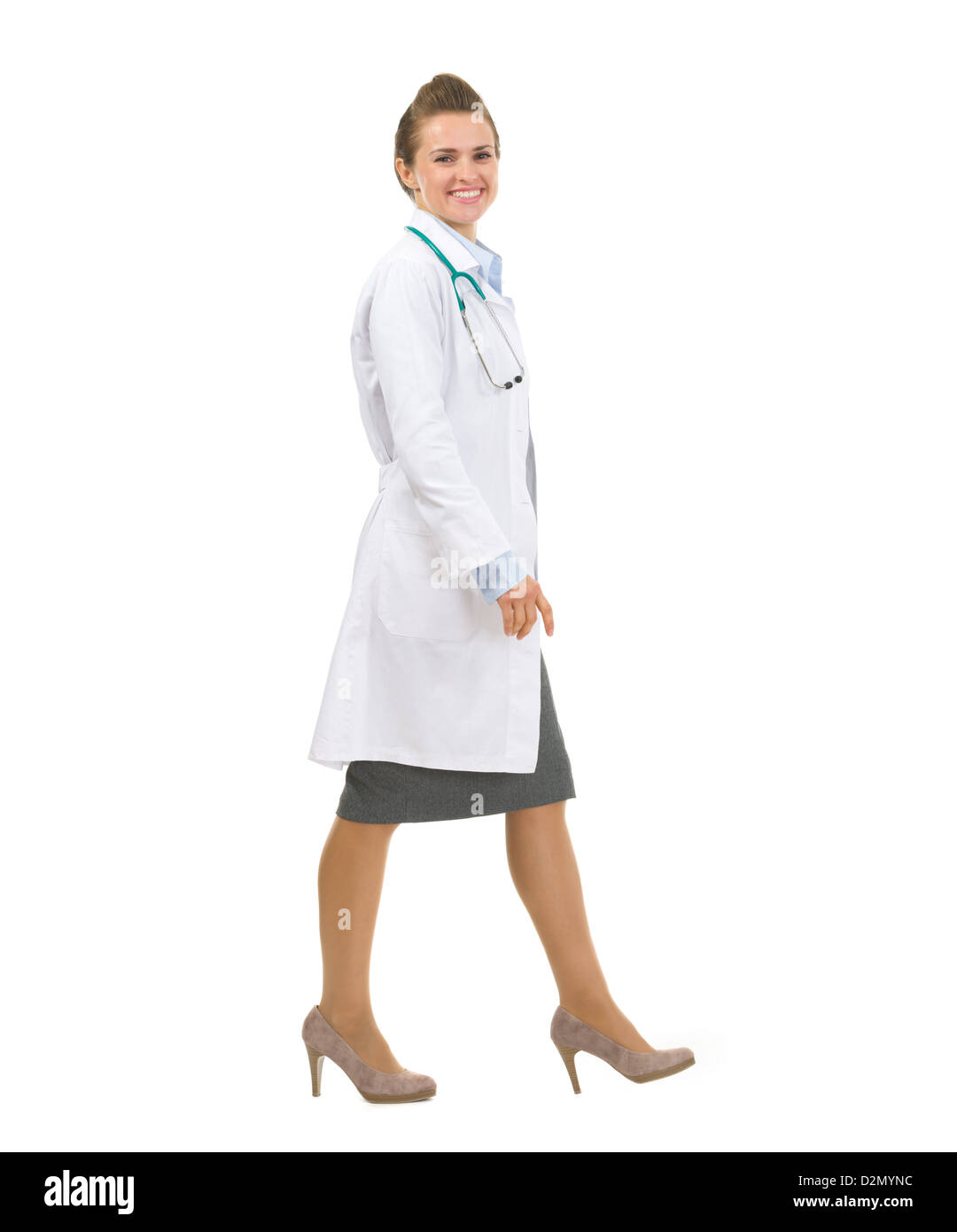 Full length portrait of medical doctor woman going sideways Stock Photo ...