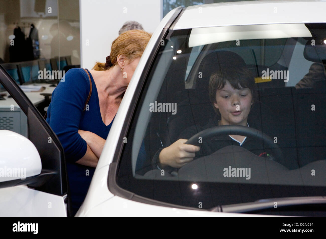 Child behind car hi-res stock photography and images - Alamy