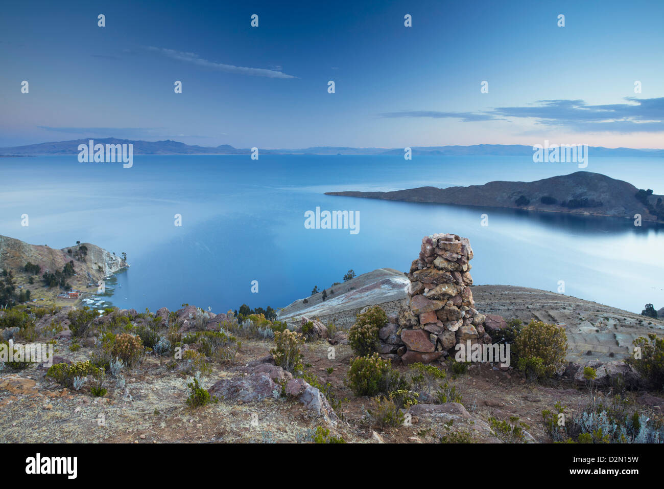 Stack of prayer stones on Isla del Sol (Island of the Sun) at sunset ...