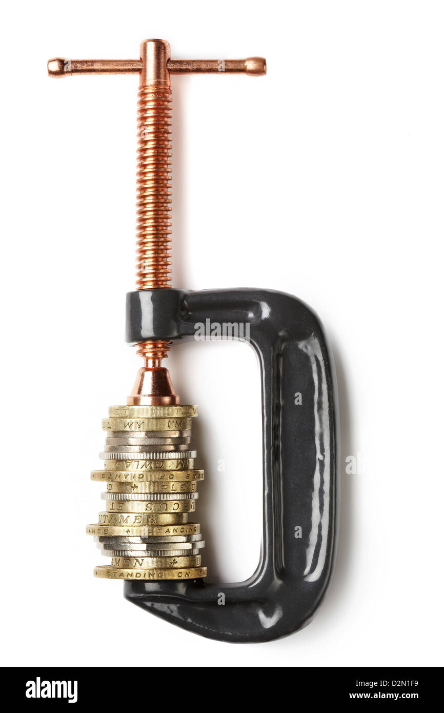 Coin Currency being squeezed in clamp isolated on white background ...