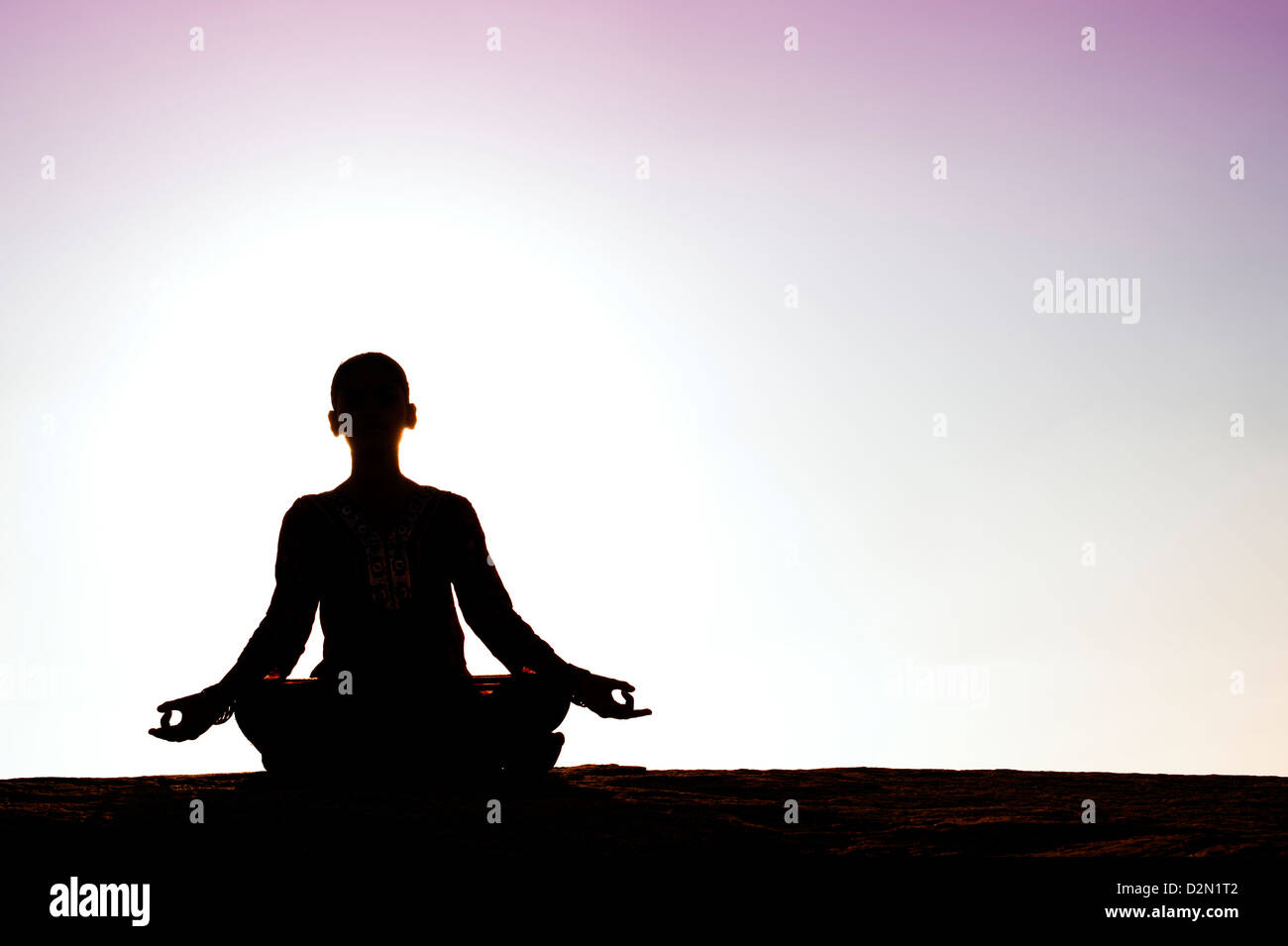 Silhouette of an Indian girl meditating. Andhra Pradesh, India Stock ...