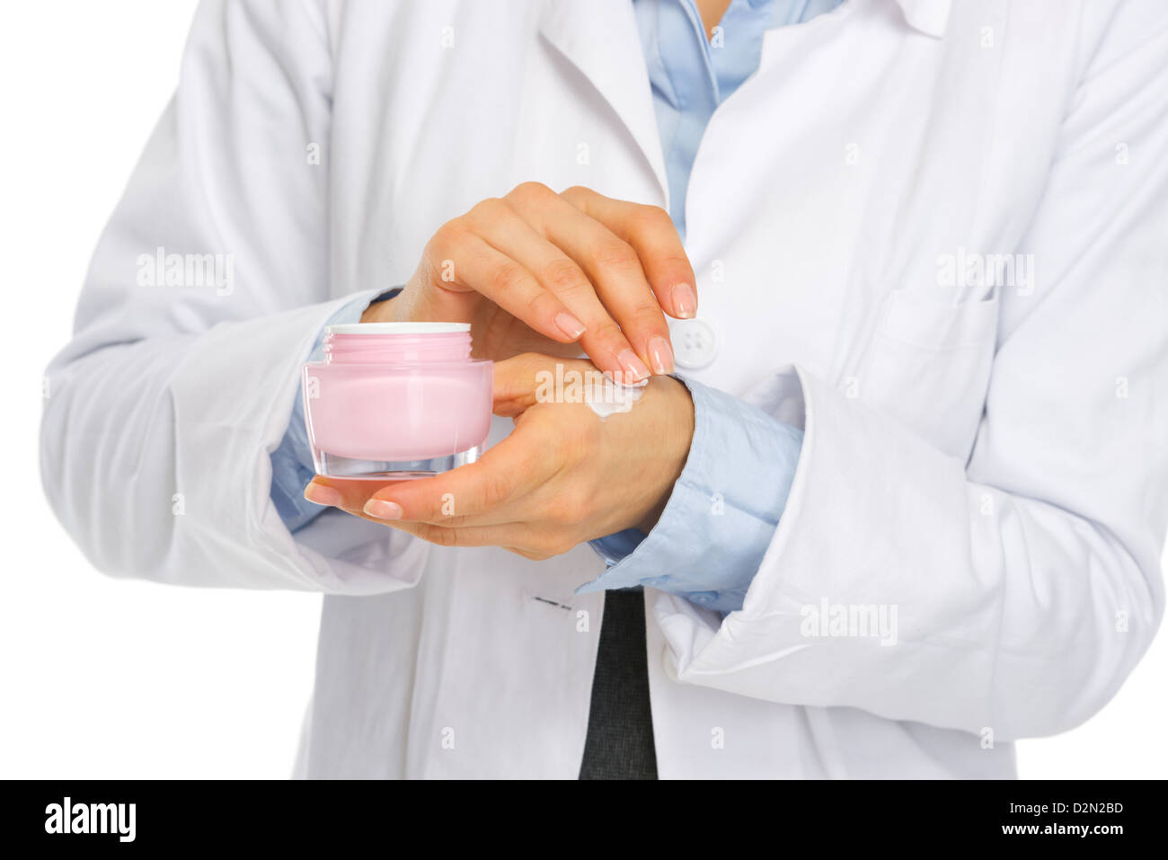 Closeup on kosmetist woman applying creme on hand Stock Photo - Alamy