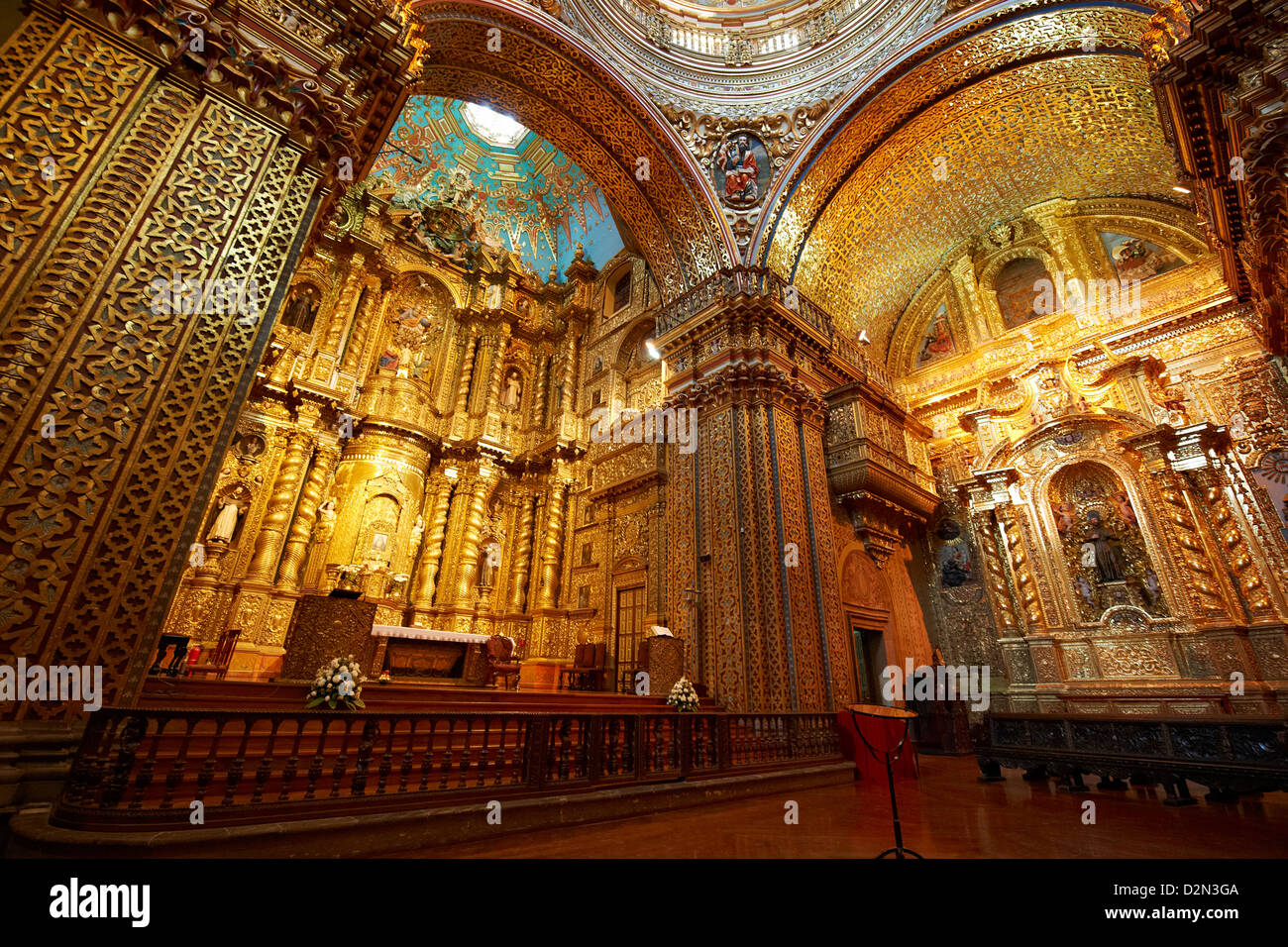 interior shot of brilliantly golden designed Compania de jesus church ...
