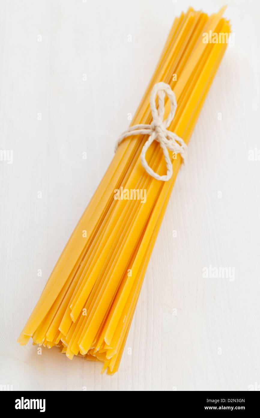 Raw italian pasta tagliatelle on hi-res stock photography and images ...