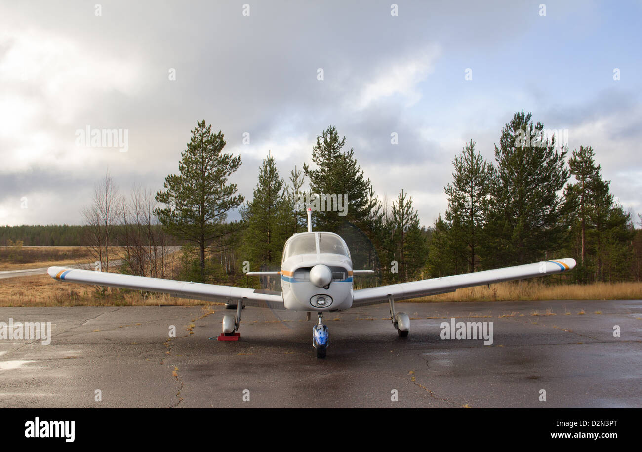 small aircraft parking stands at the airfield in the forest ready to go ...