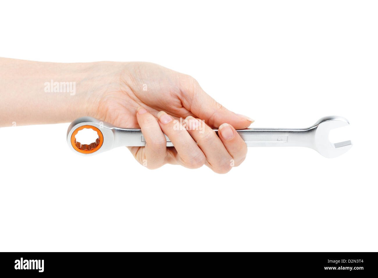 Wrench in female hand. Isolated on white Stock Photo - Alamy