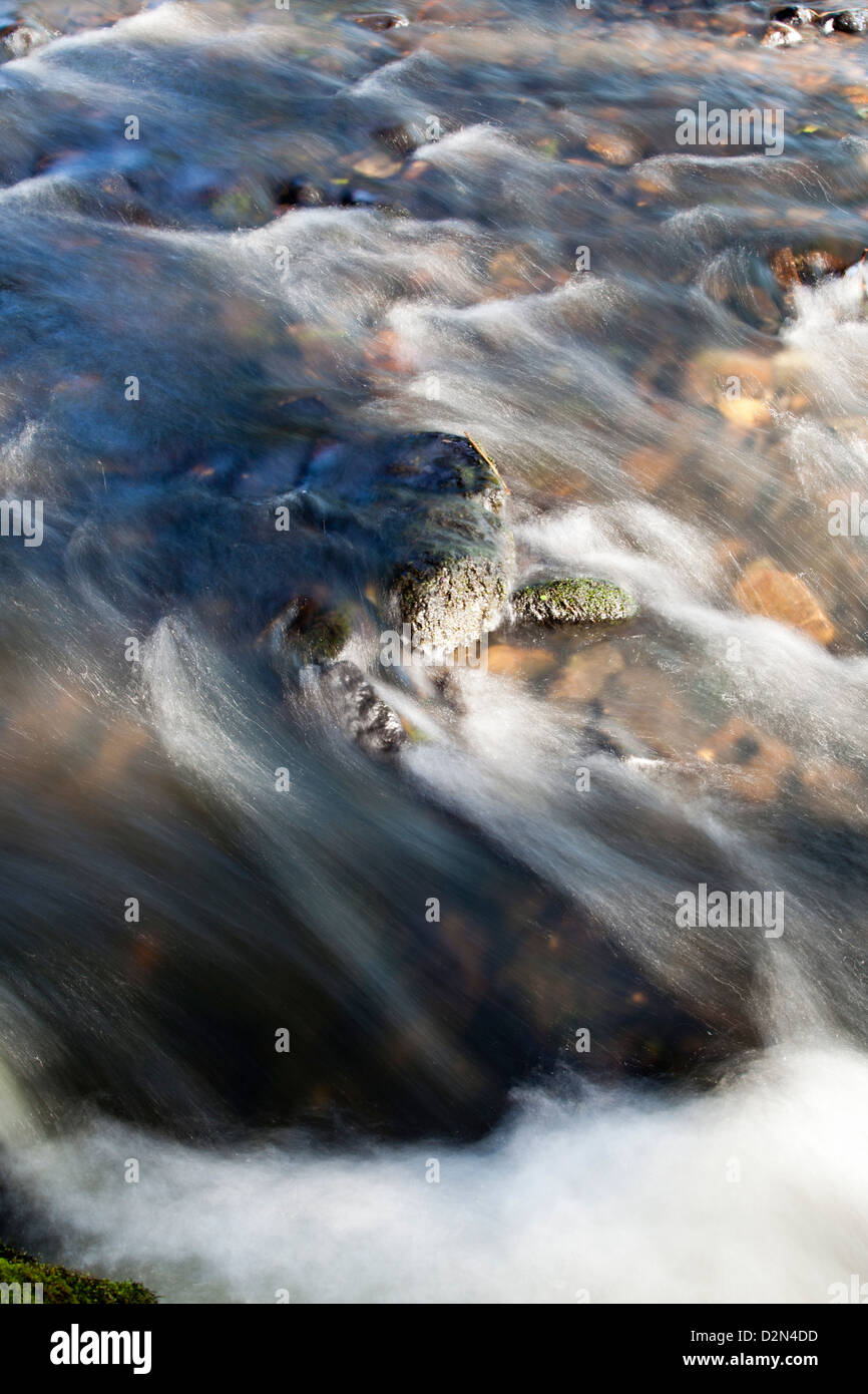 Fast flowing water in a Pennine river Stock Photo - Alamy