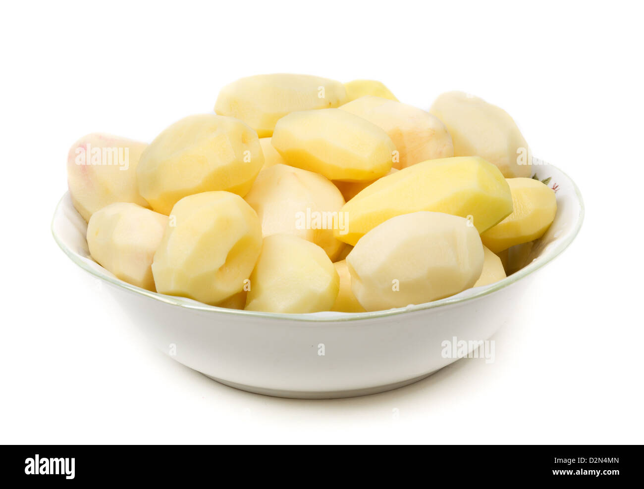 Peeled potatoes on plate, isolated on white background Stock Photo - Alamy