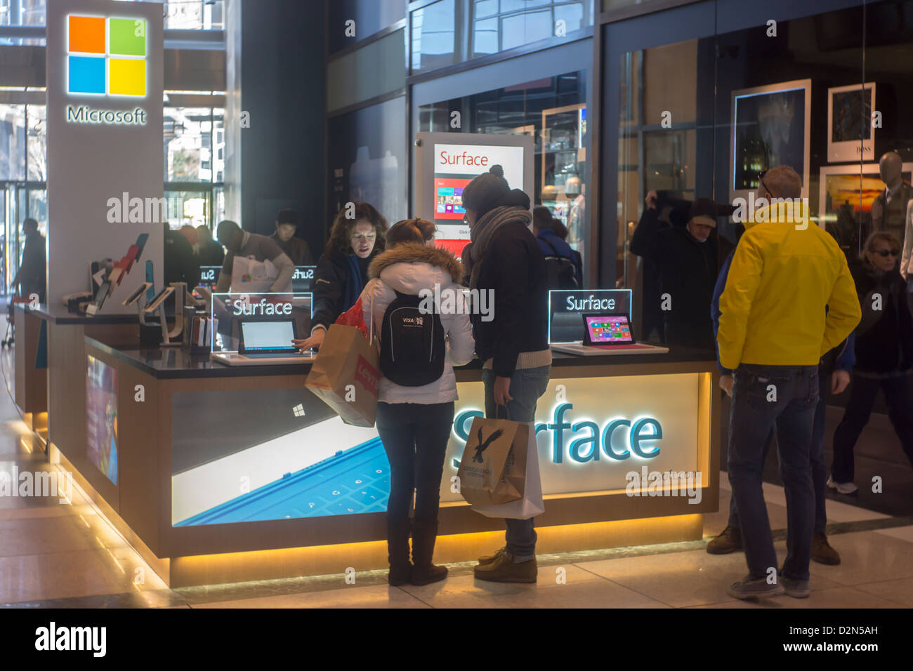 Shoppers at the Microsoft kiosk in the Time Warner Center in New York ...